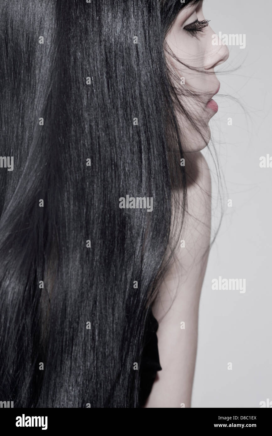 Attractive dark-haired young woman Stock Photo - Alamy