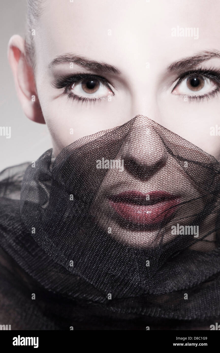 Young woman with a cloth, portrait Stock Photo - Alamy