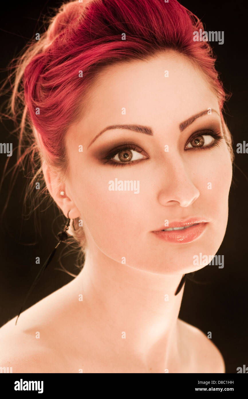 Attractive red-haired young woman, portrait Stock Photo - Alamy