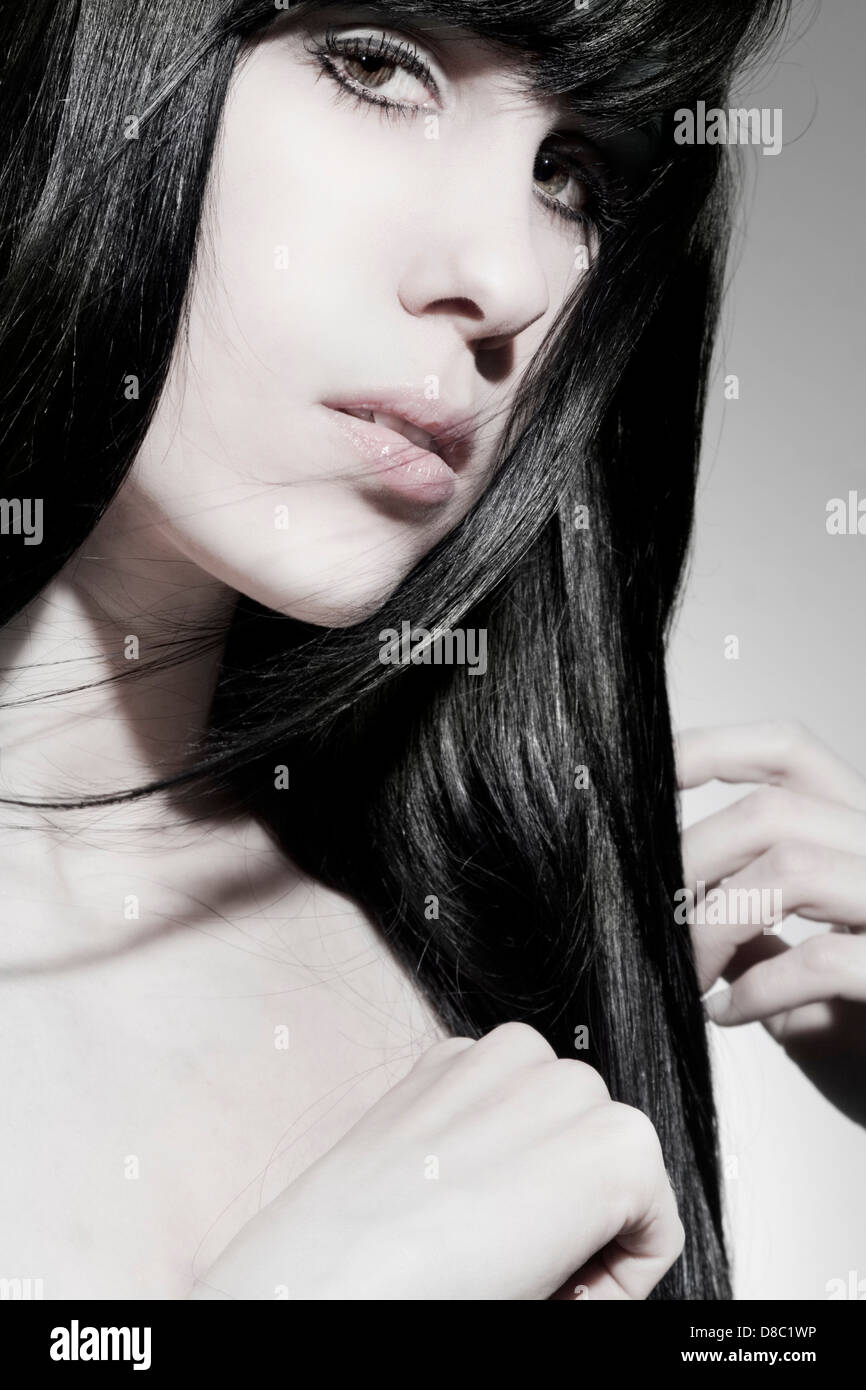 Attractive dark-haired young woman, portrait Stock Photo - Alamy