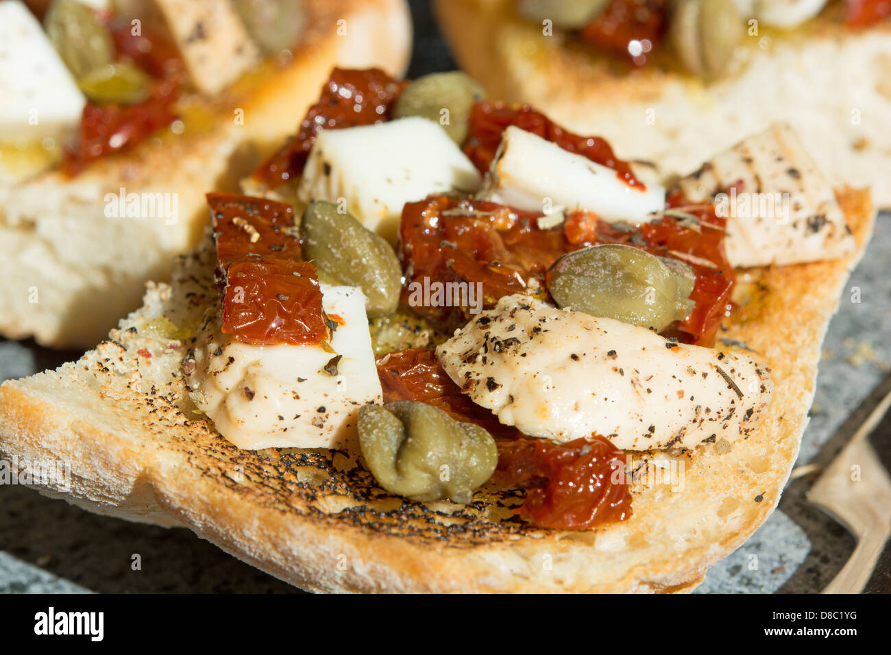 Maltese hobz-bi-zejt (bread brushed with olive oil, toasted and topped ...