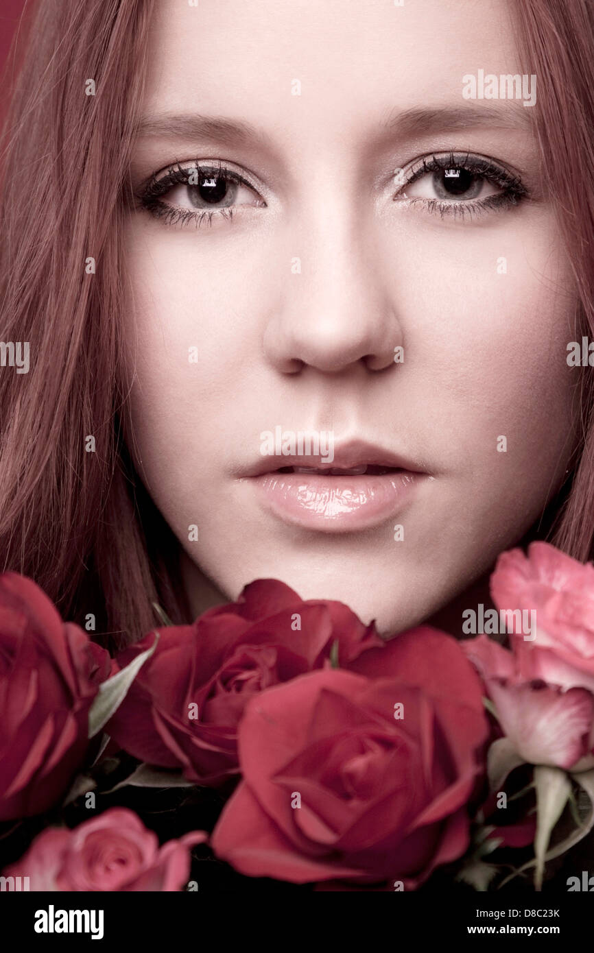 Woman with roses Stock Photo - Alamy