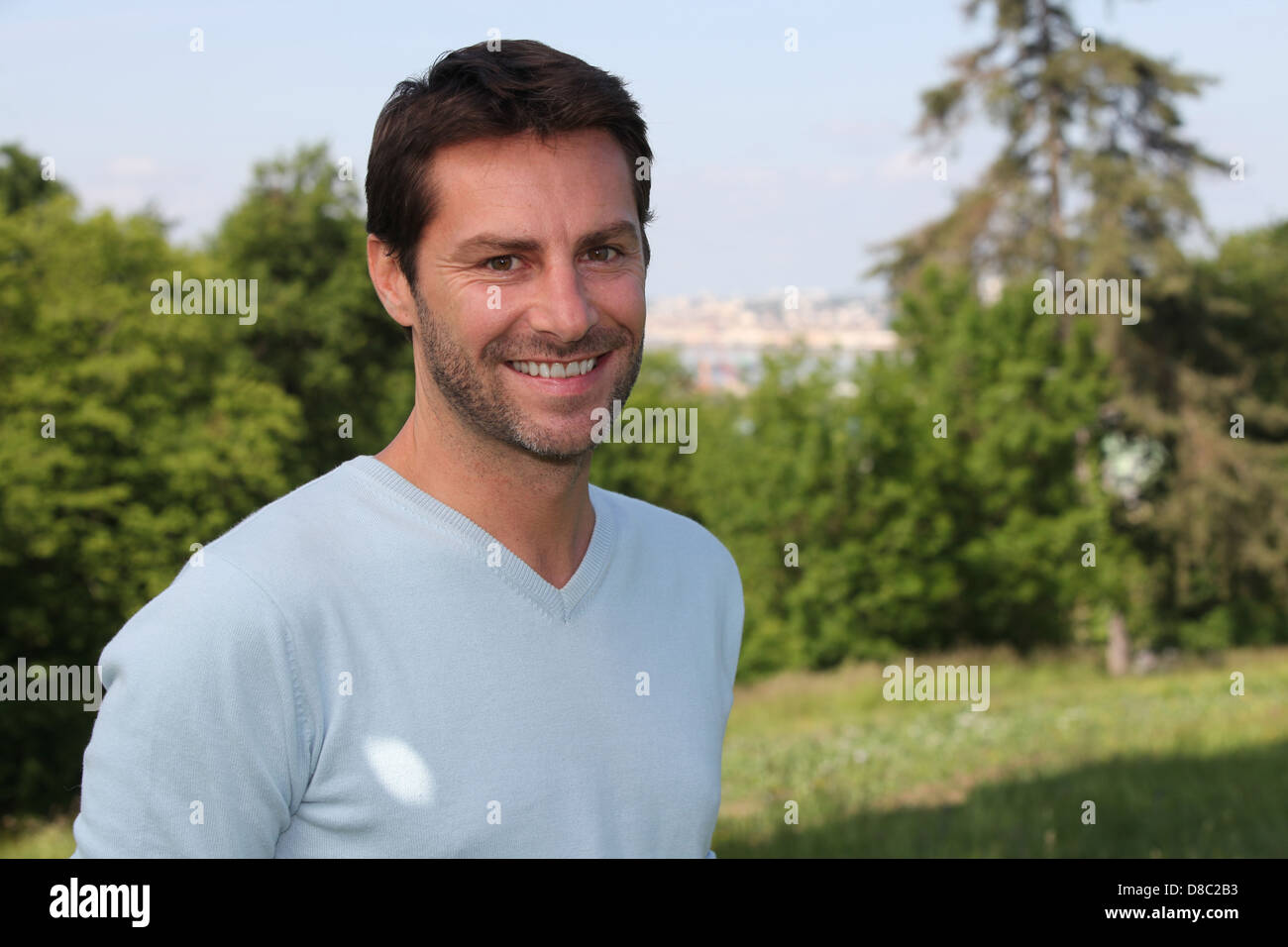 Man stood in his garden Stock Photo - Alamy
