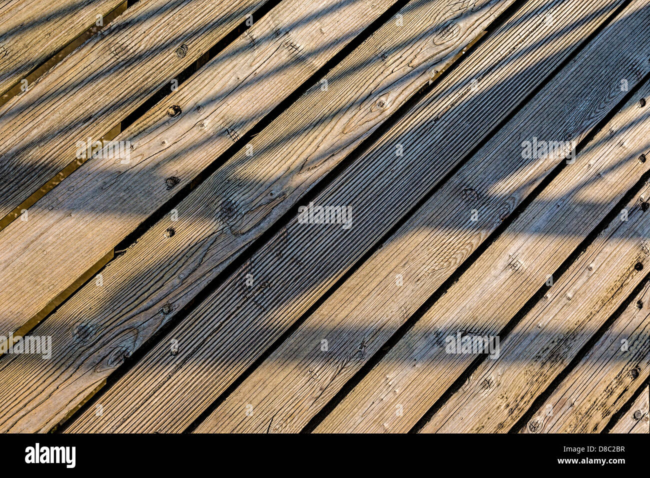Wooden board flooring with shadows Stock Photo - Alamy