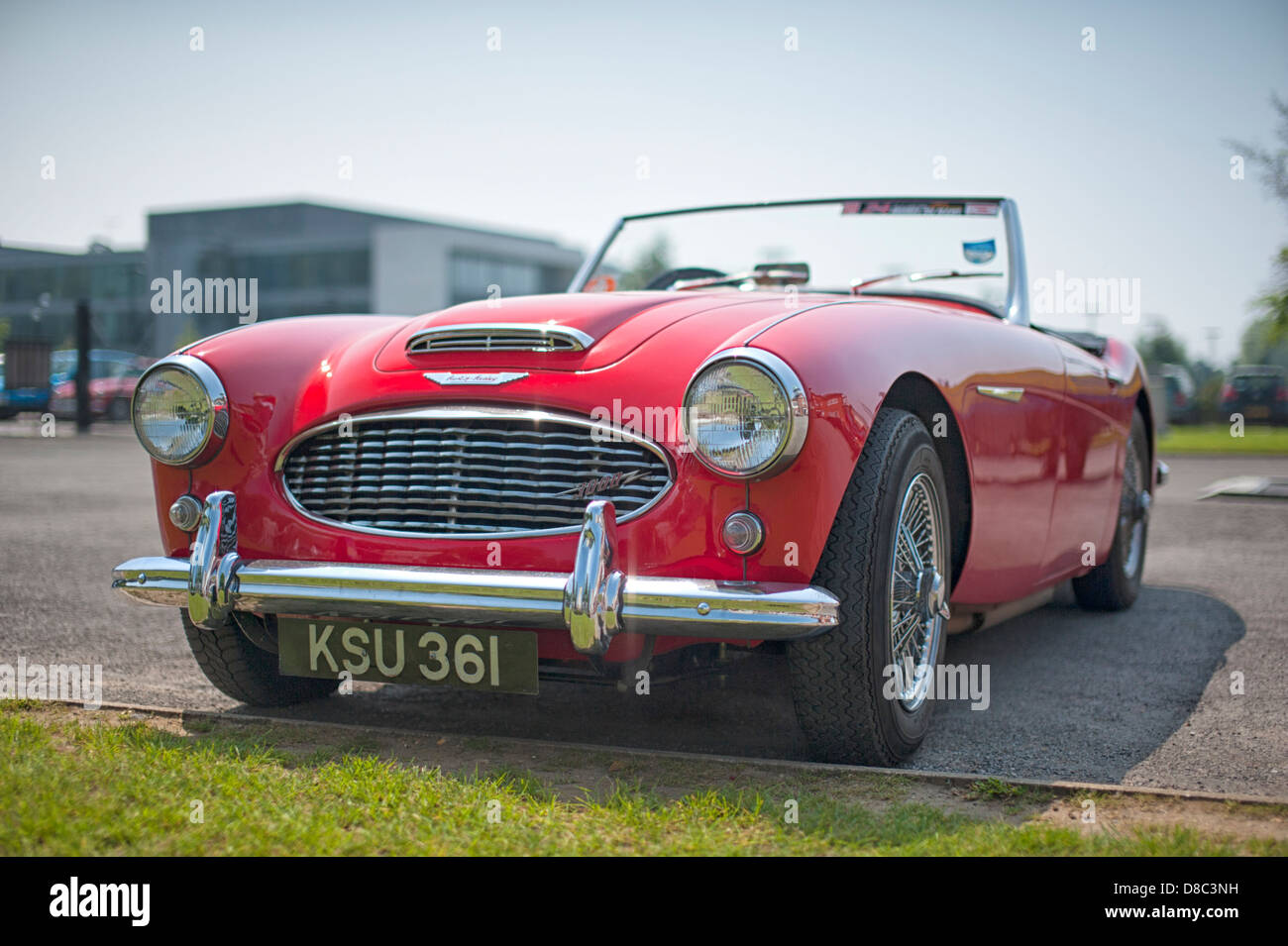 Beautiful bright red classic Austin Healey sports car Stock Photo - Alamy