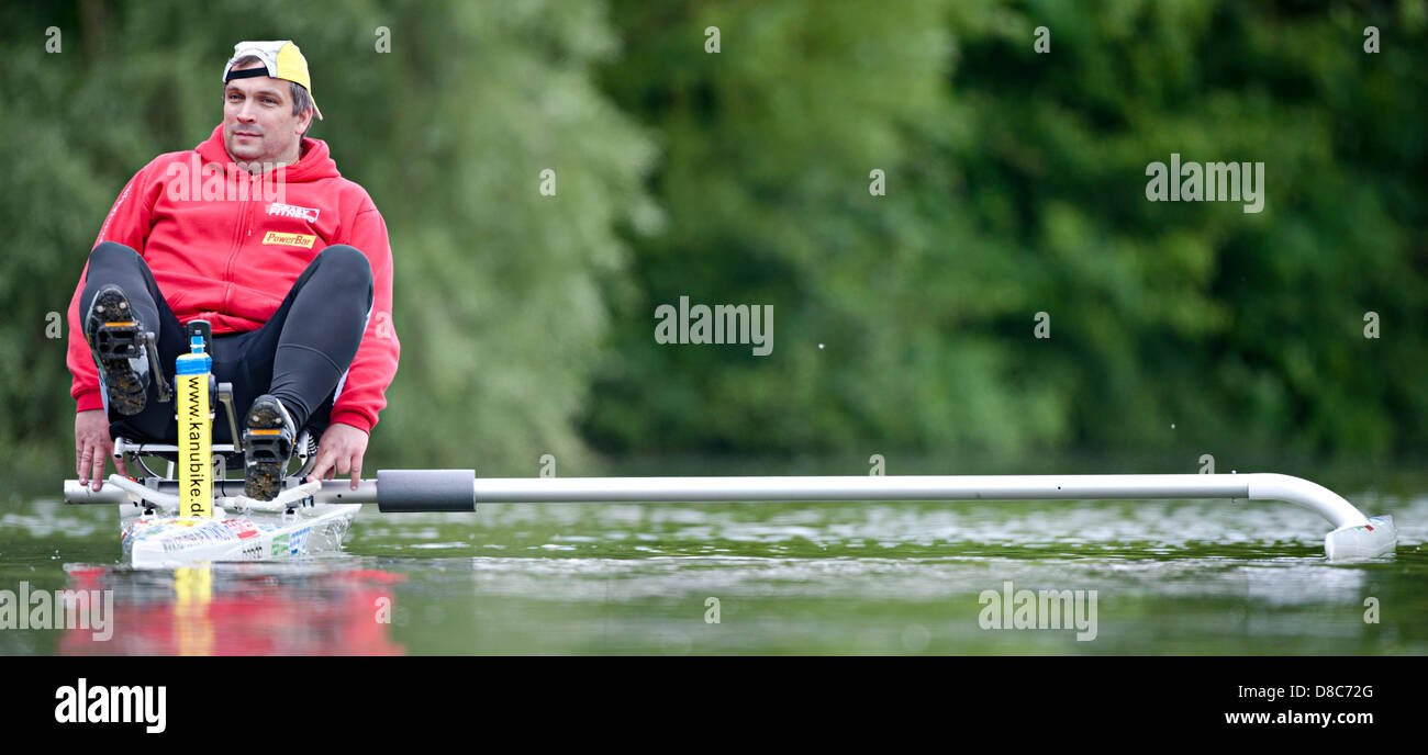 Ingo-Kai Schoffer rides his canoe bike on Max-Eyth Lake in Stuttgart, Germany, 24 May 2013. The ...