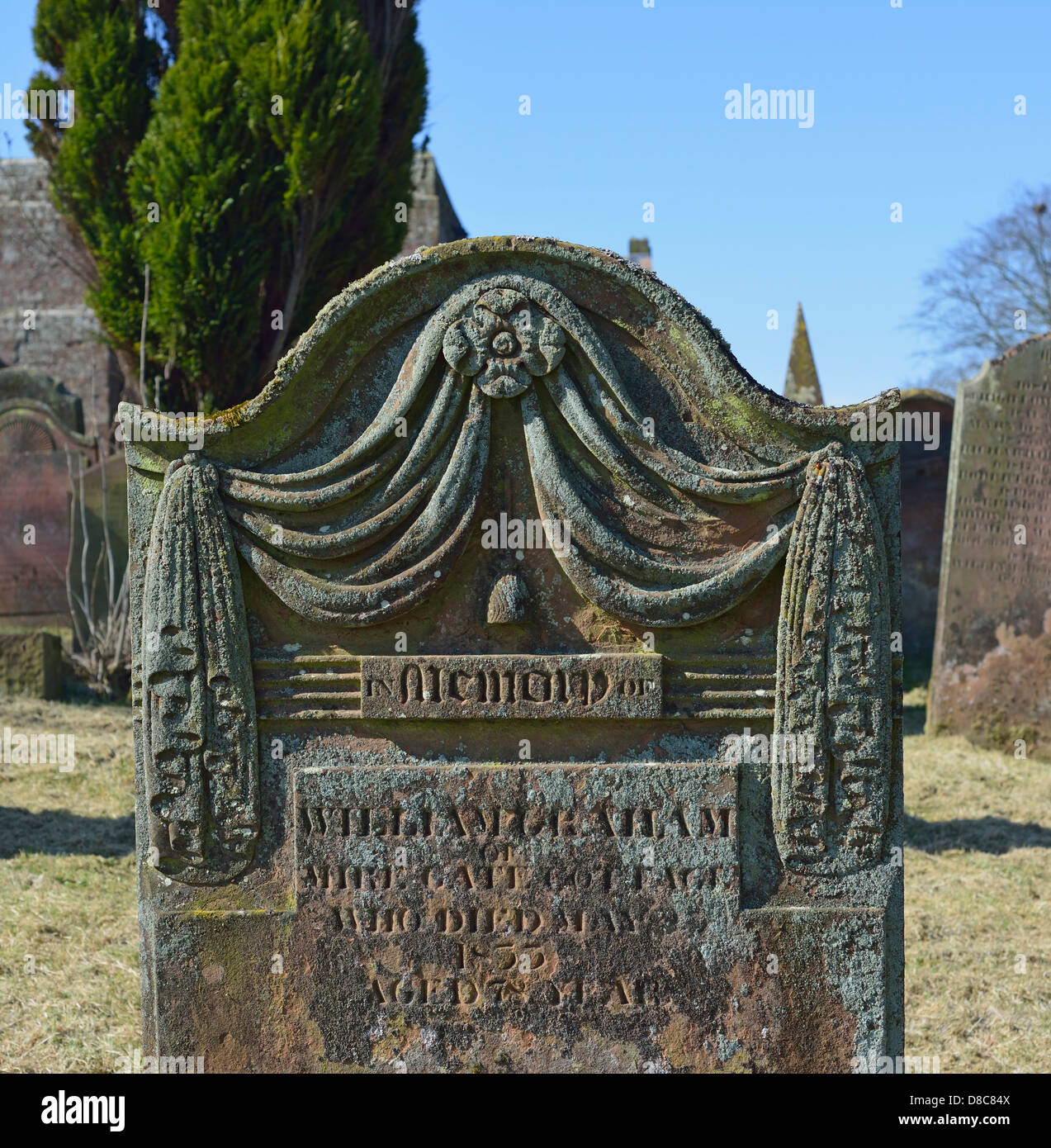 Gravestone with flower and drapes design (detail). Church of St. Mary ...