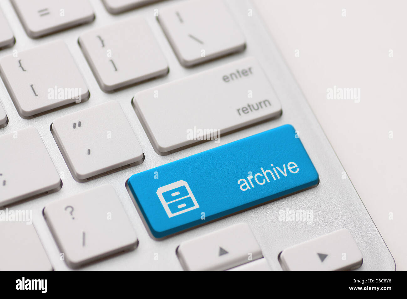 archive enter button key on white background Stock Photo - Alamy