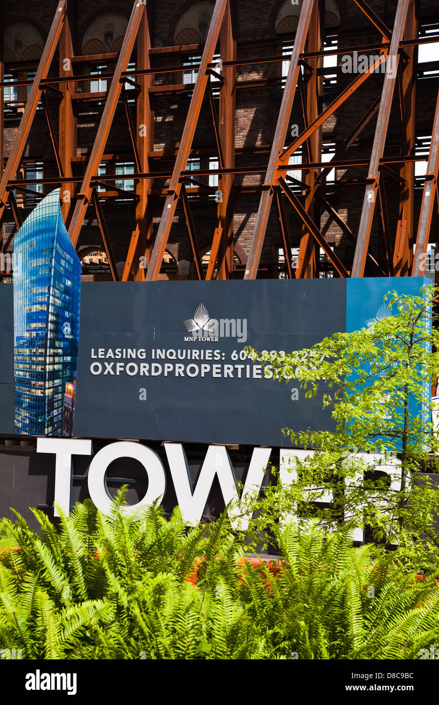 Steel structure retaining the facade of an older building which is to ...