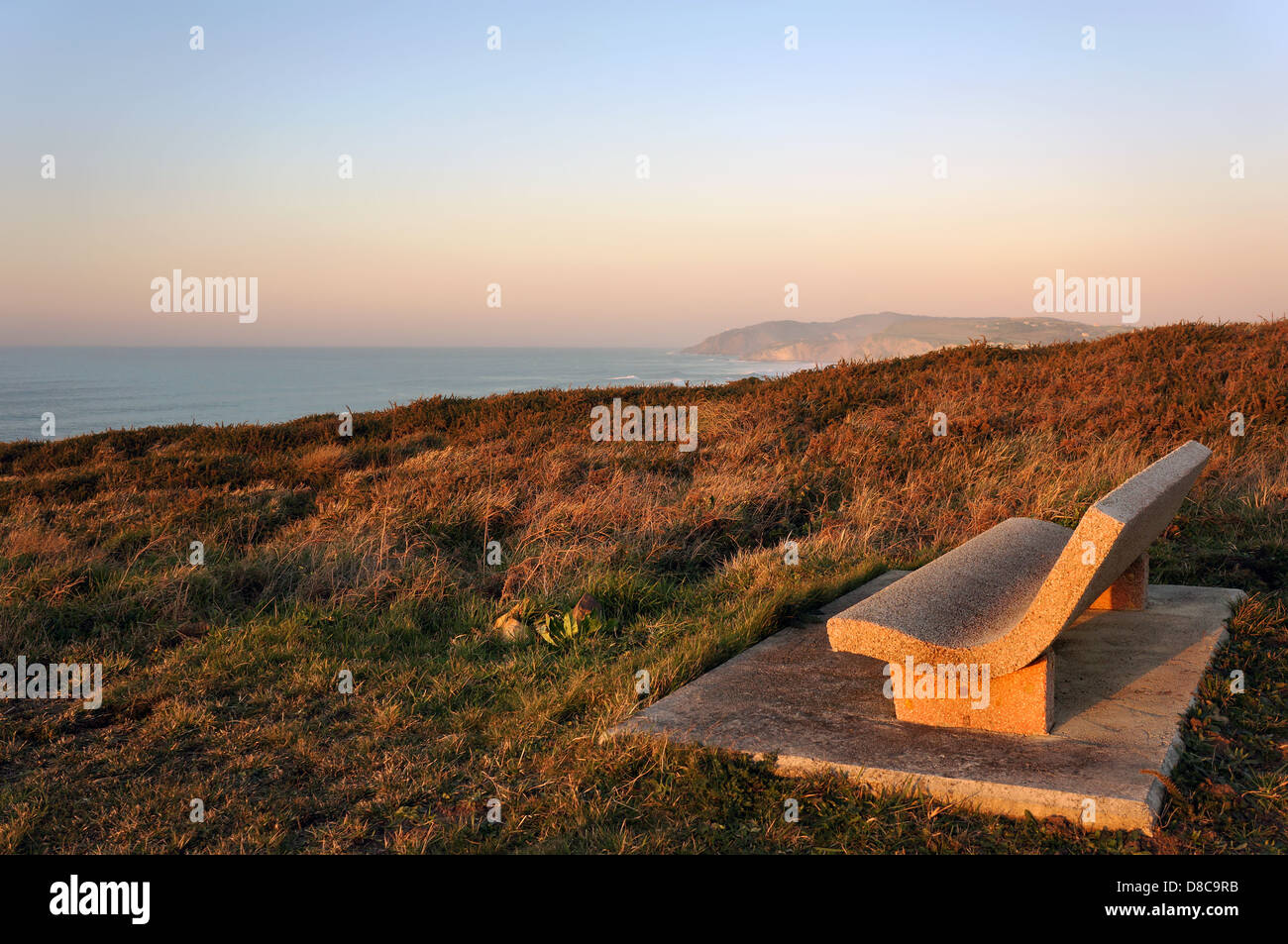 stone bench near sea at sunset Stock Photo - Alamy