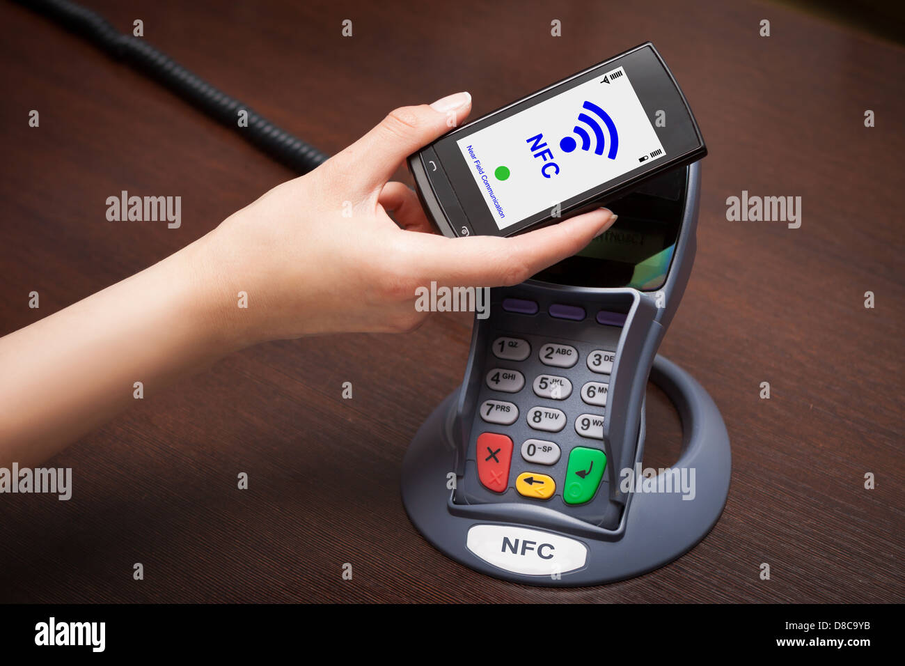 NFC - Near field communication / mobile payment Stock Photo - Alamy