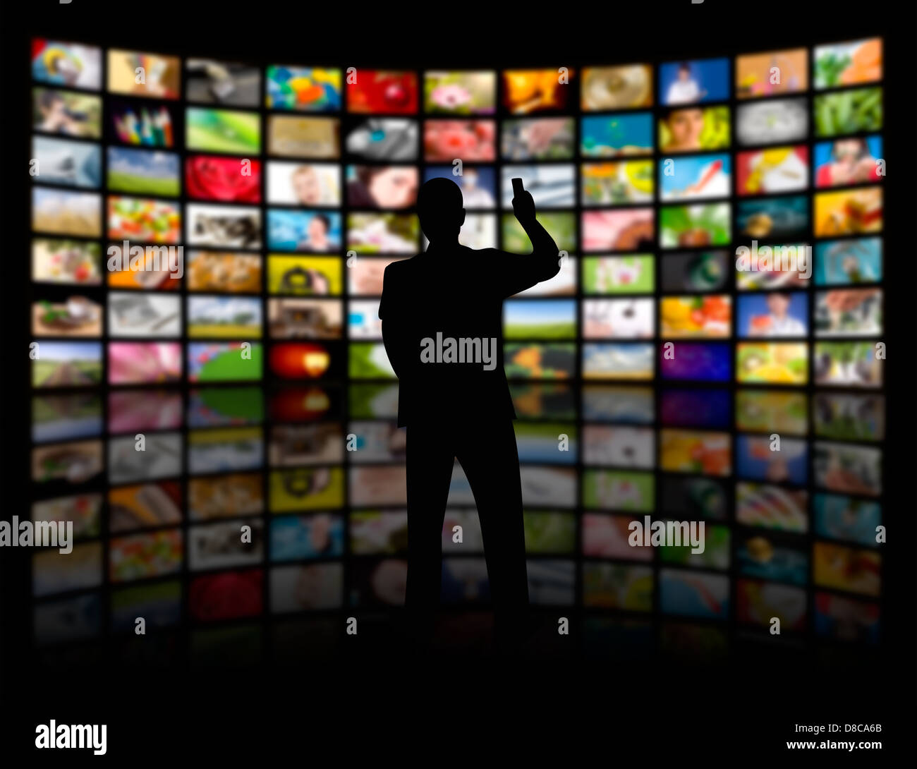 Back view of a young man watching a big TV panel Stock Photo - Alamy