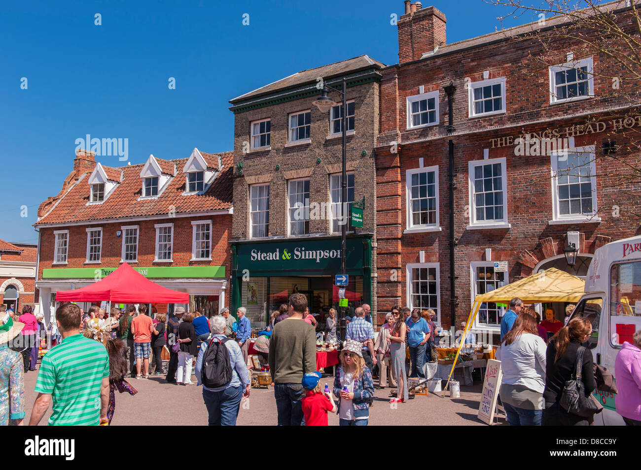 An antiques fair in the town centre of Beccles , Suffolk , England ...