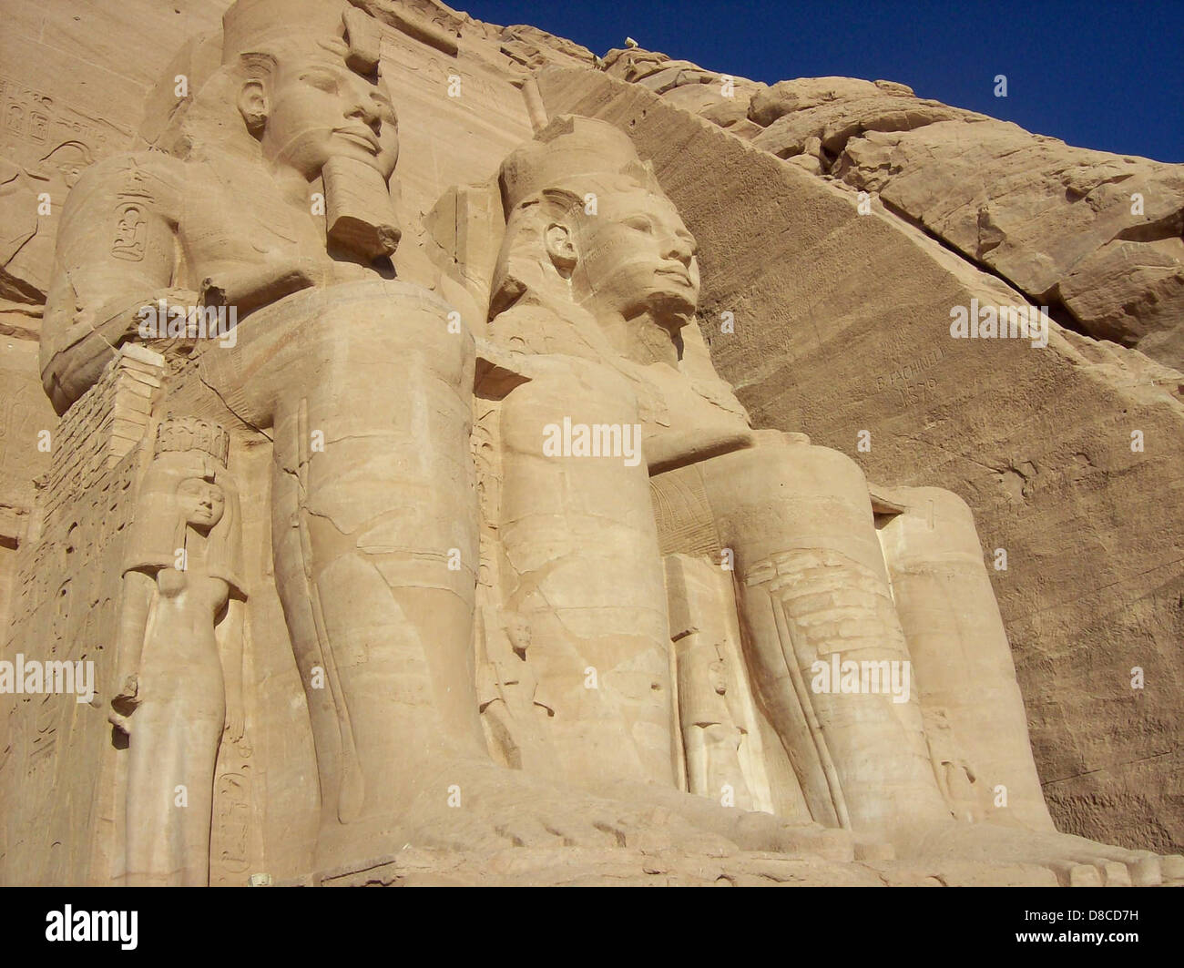 The Abu Simbel statues in Egypt, massive rock carvings of Pharaoh ...