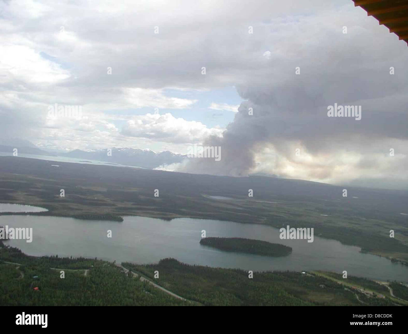 Aerial photography of forest fire in distance Stock Photo - Alamy