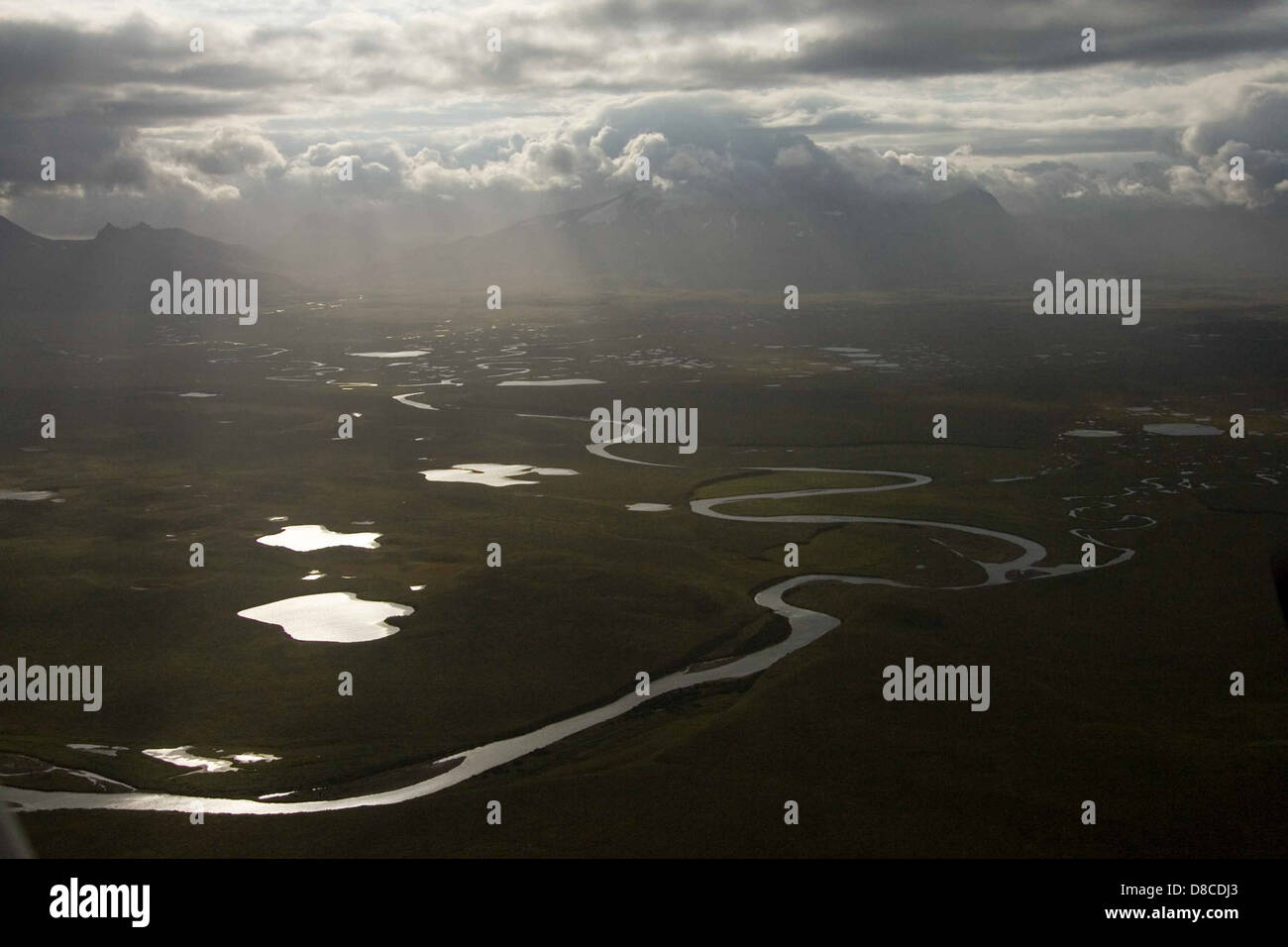 An aerial view of a scenic landscape featuring various bodies of water ...