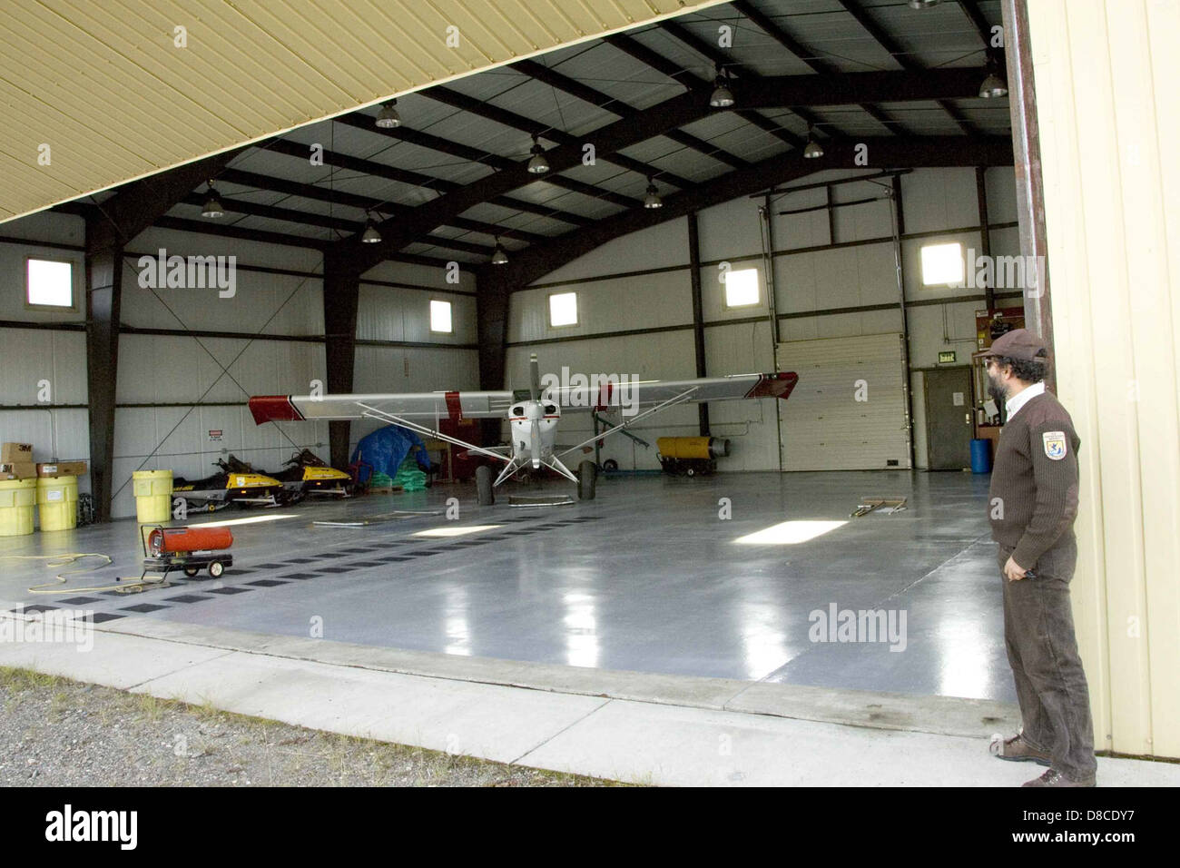 An aircraft hangar used to store and maintain aircraft. The large ...