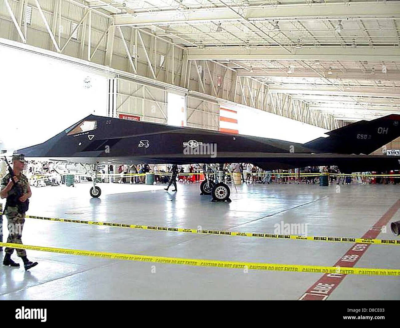 An advanced stealth fighter jet is captured mid-flight, showcasing its ...