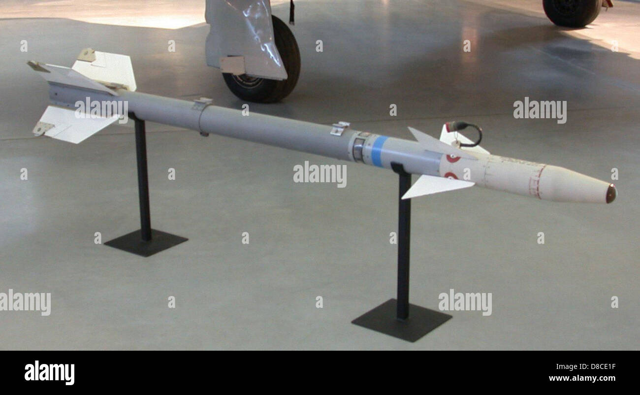A photo of an air-to-air missile in flight, designed for combat. The ...