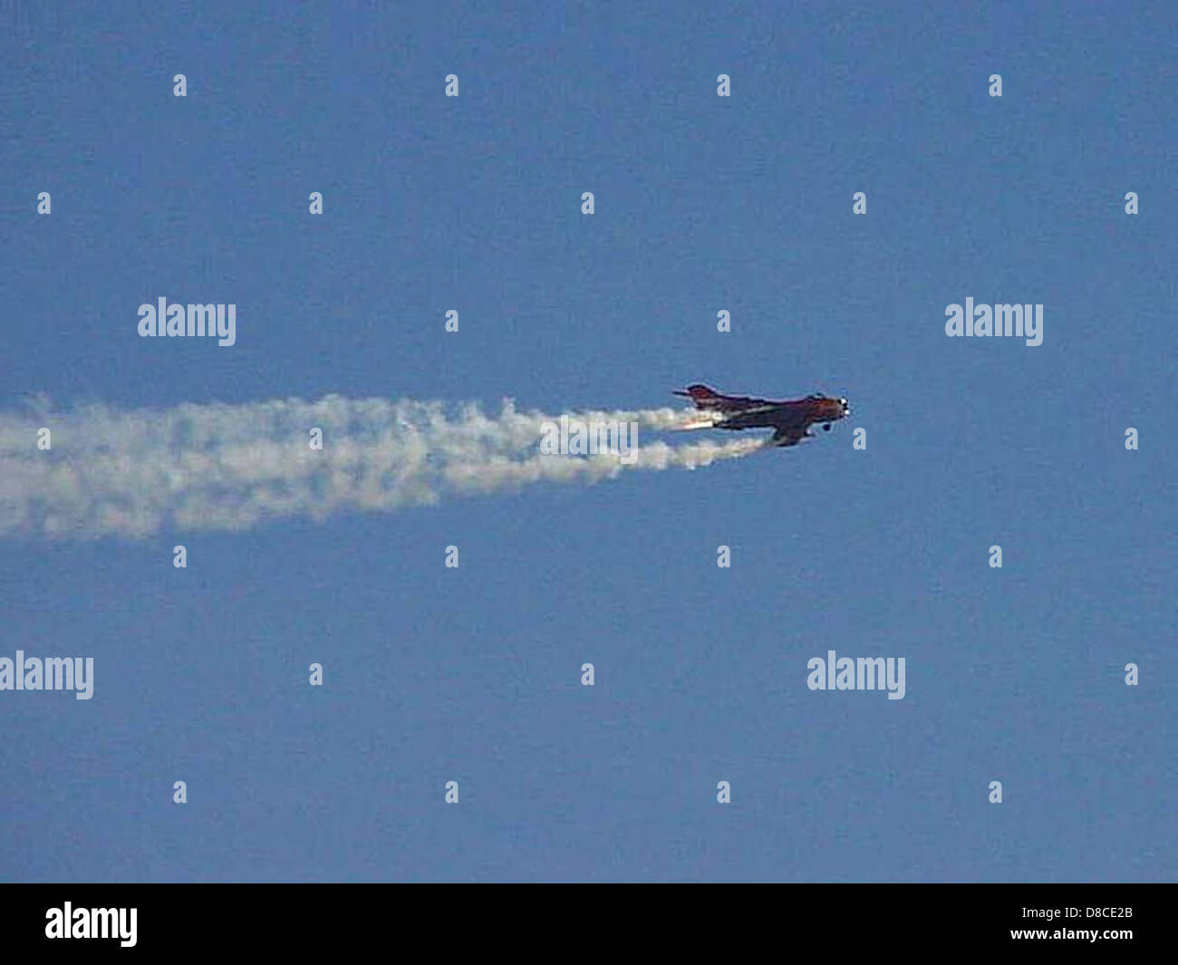 A MIG jet airplane captured mid-flight. The sleek aircraft showcases ...