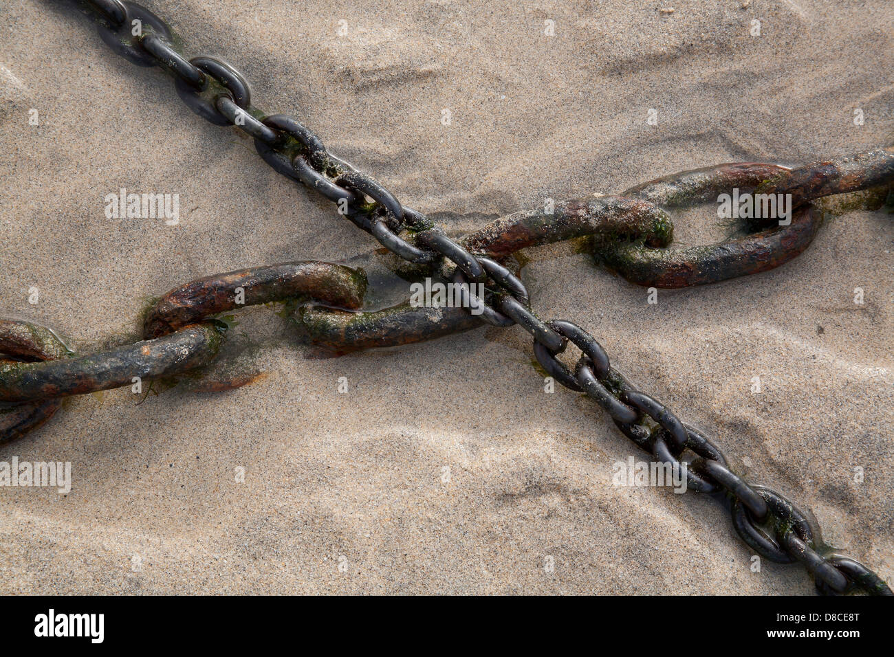 Crossed chains on the sand, Harbour beach, St Ives Cornwall England UK ...