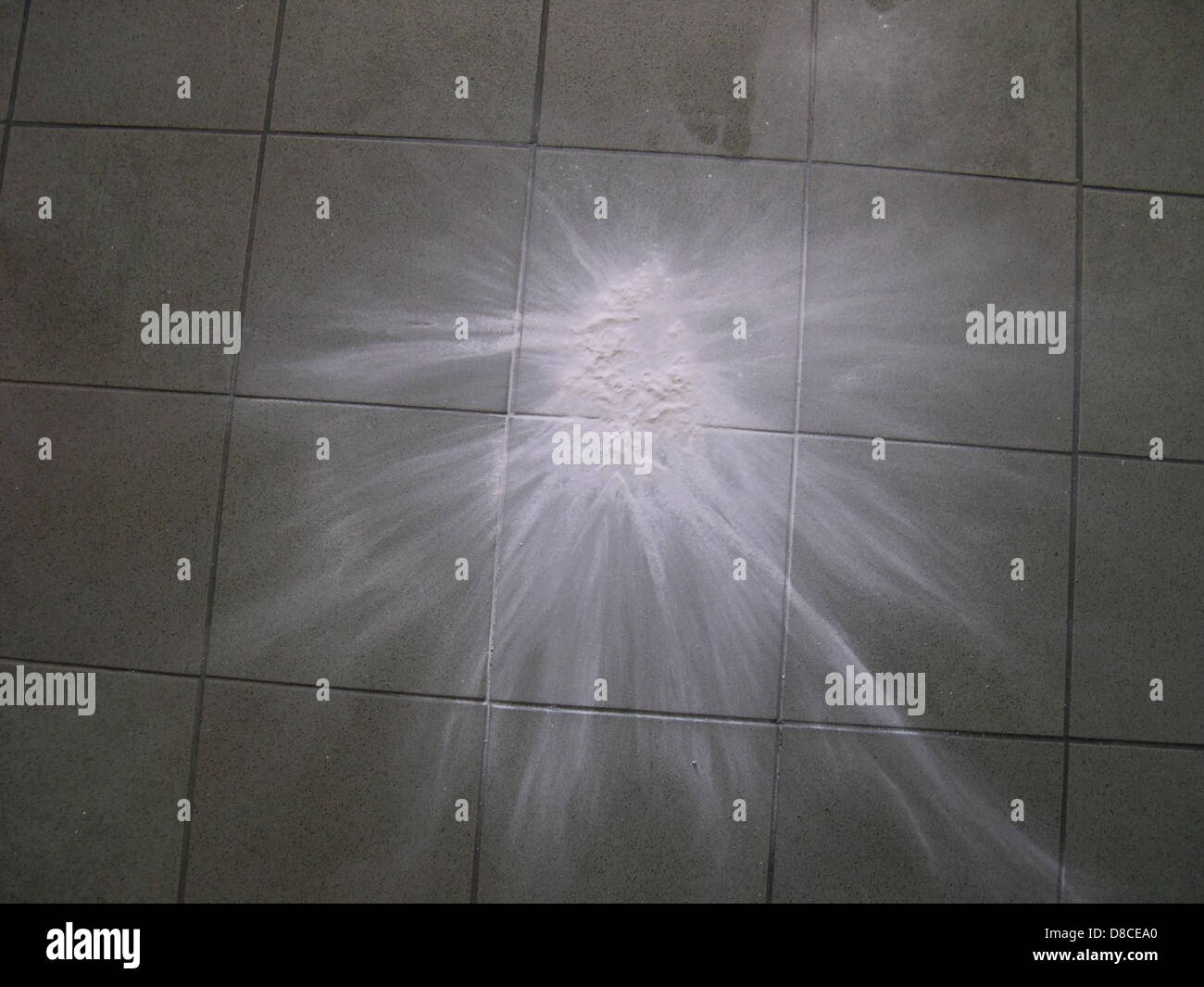 A humorous image of baking powder splattered across the kitchen floor ...