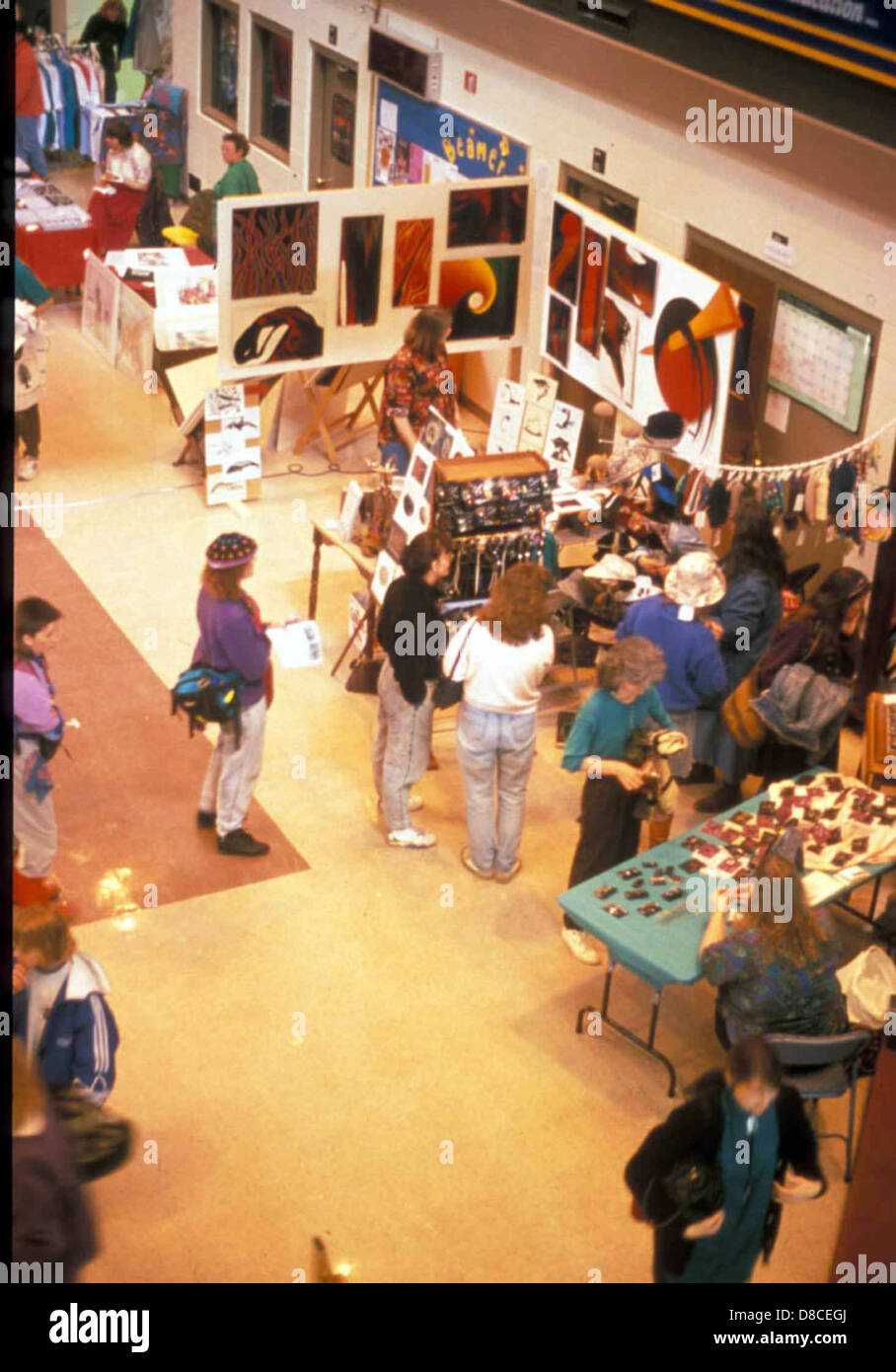 This image shows an arts and education fair, with booths and displays ...