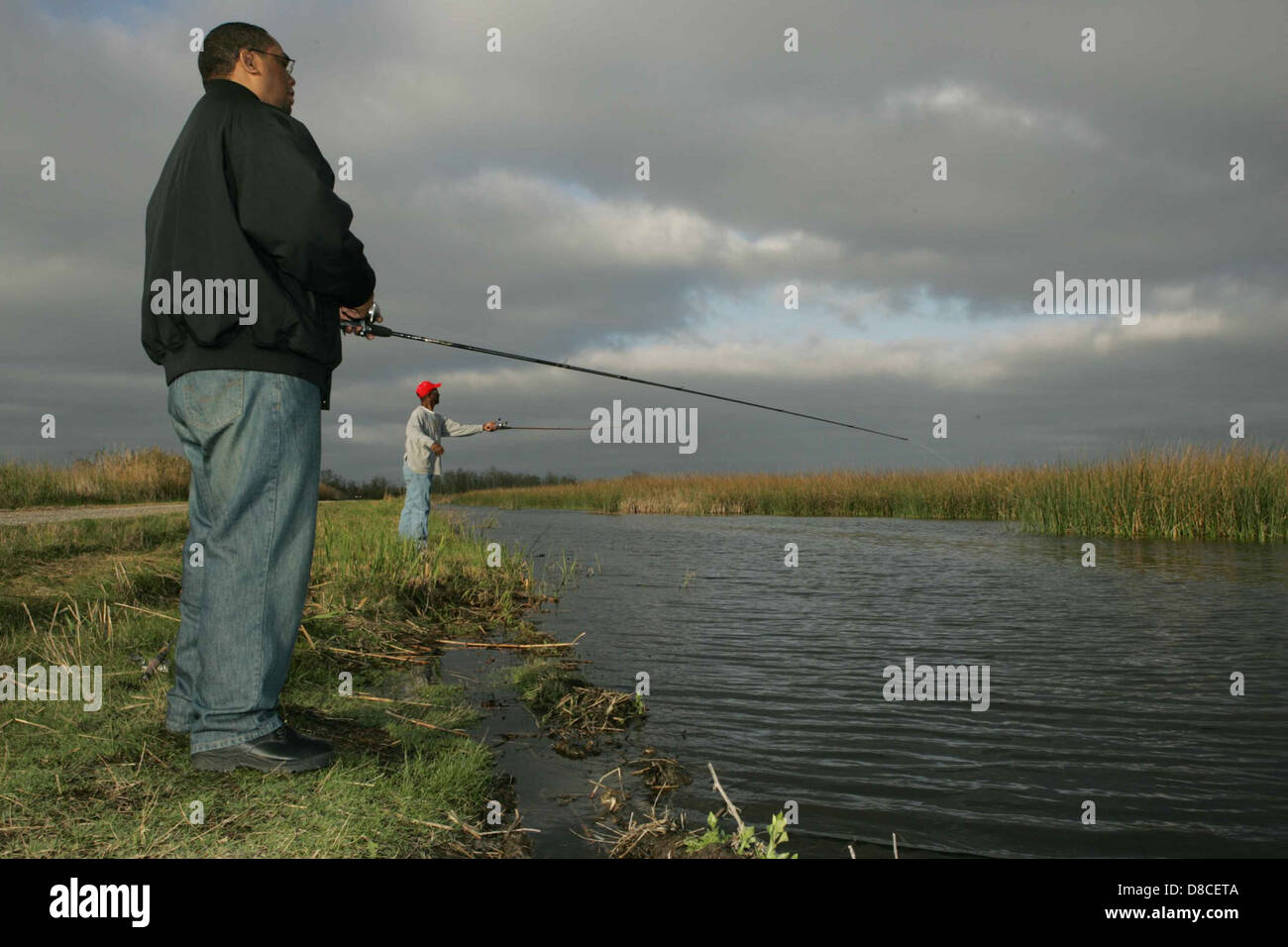 This image depicts an angler enjoying a successful day of fishing on a ...