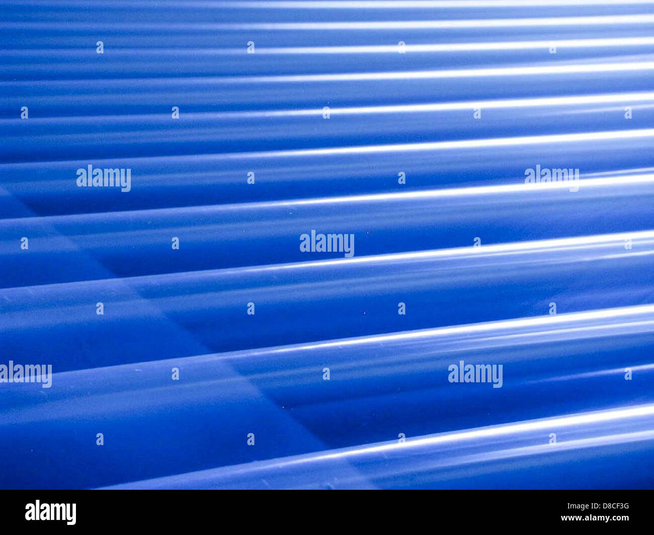 A background featuring blue stripes, with alternating shades of blue ...