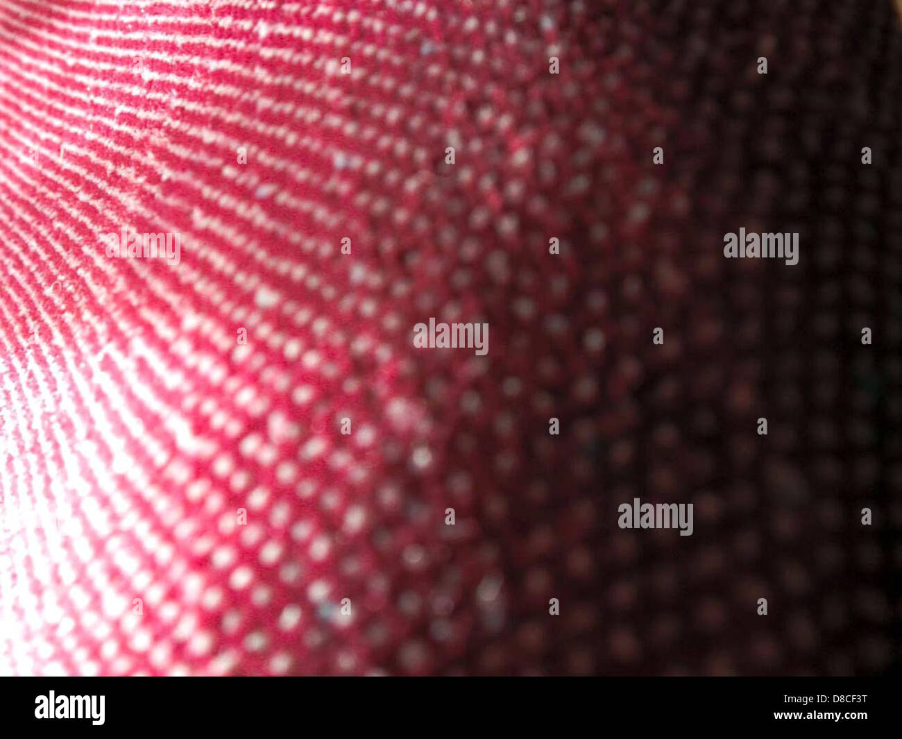 A simple red background is depicted in this image, offering a solid ...