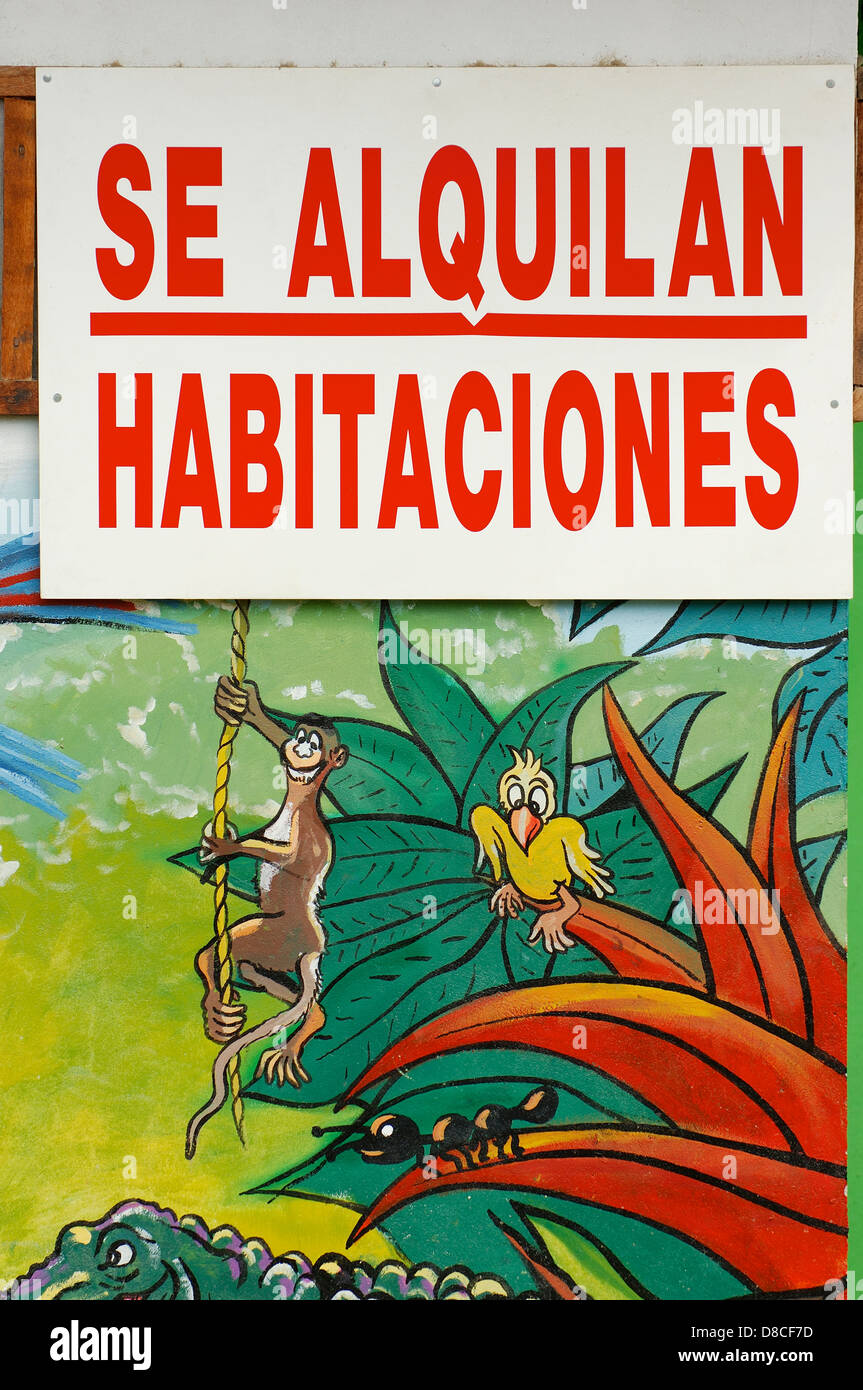 Colorful commercial sign announcing rooms for rent Stock Photo - Alamy