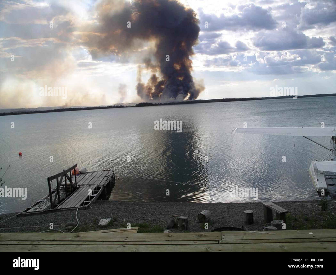 Black smoke rising Stock Photo - Alamy