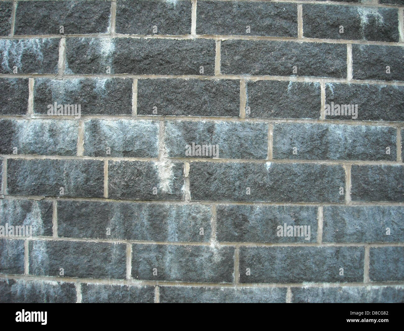 A close-up of a brick wall showcasing the texture and pattern of the ...