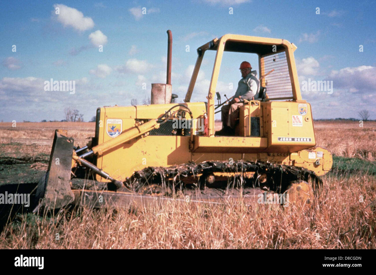 A stock photo of a bulldozer vehicle in operation at a construction ...