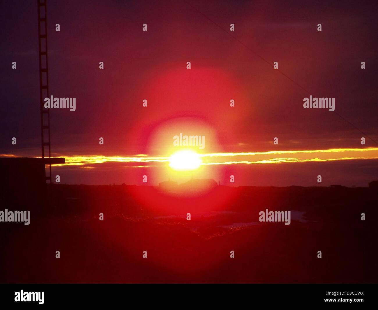 A stunning sunset over a landscape affected by wildfire in Canada. The ...