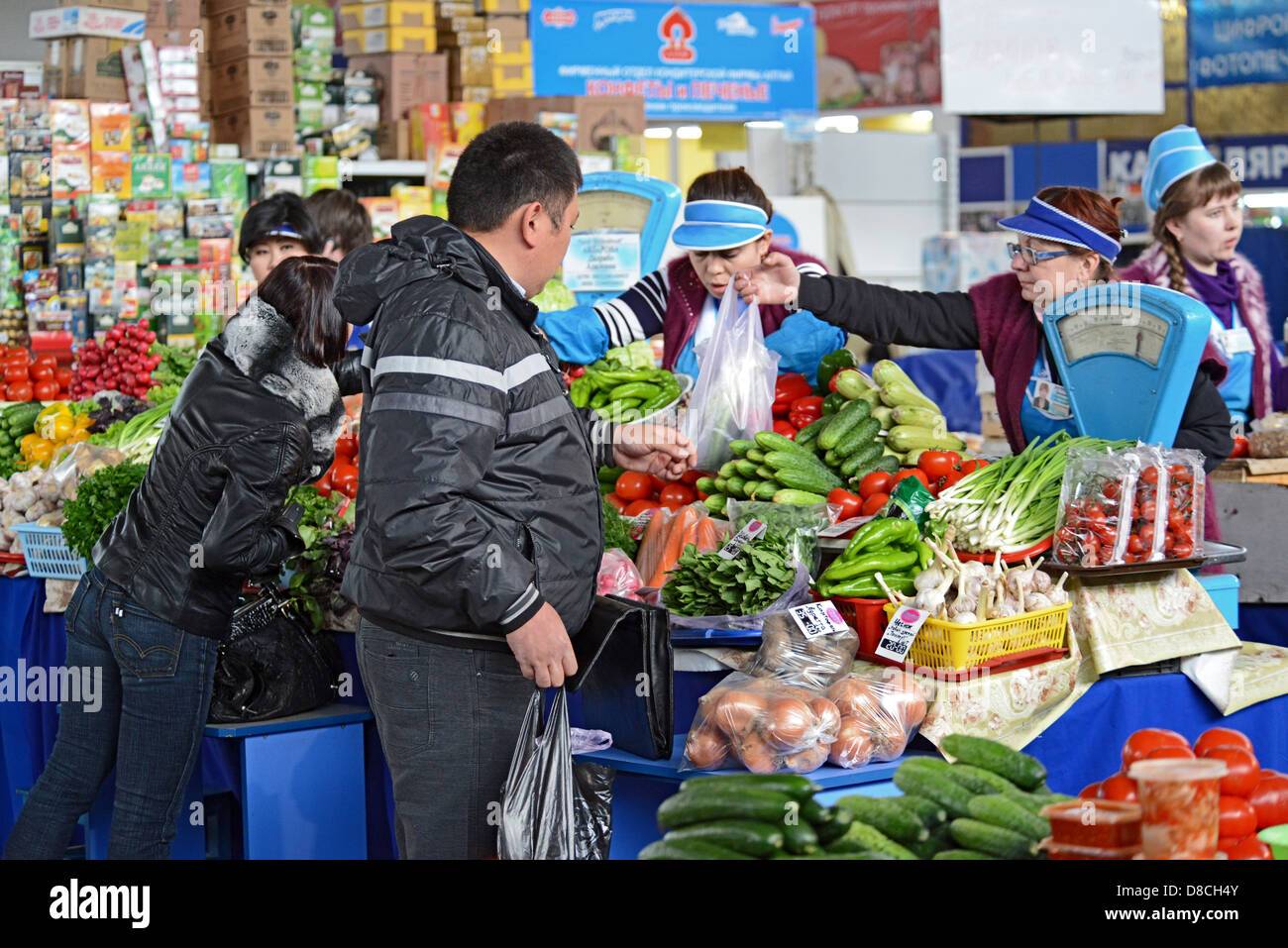 Vegetables and vegetables seller and customer from above. Noviy Rynok ...