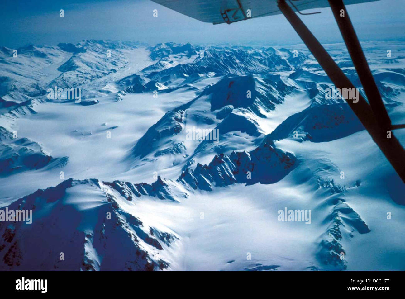 An aerial view of the Chugach Mountains, covered in snow. The Chugach ...