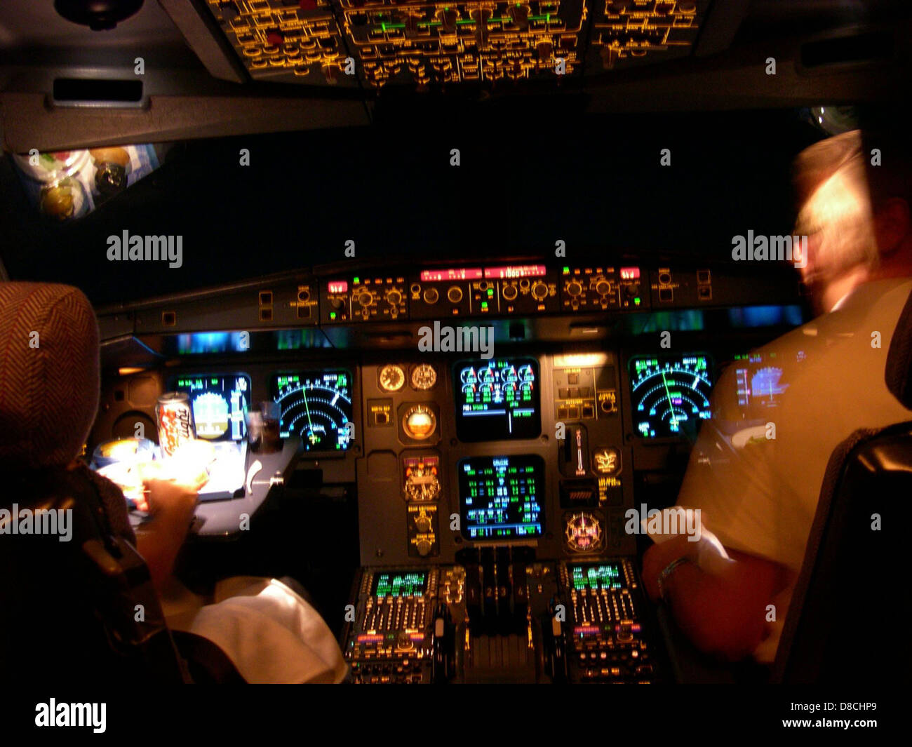 The cockpit of an Airbus aircraft is shown, featuring the pilot’s ...