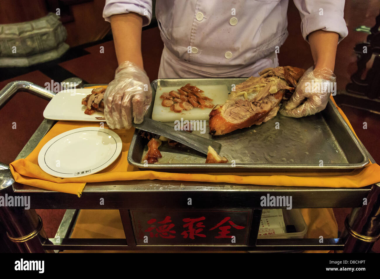 Chef in Beijing preparing a Peking duck, Beijing, China Stock Photo - Alamy