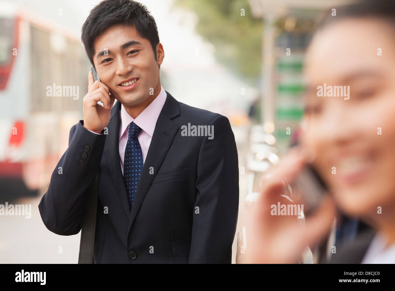 Young Businessman on the phone, portrait, Beijing Stock Photo - Alamy
