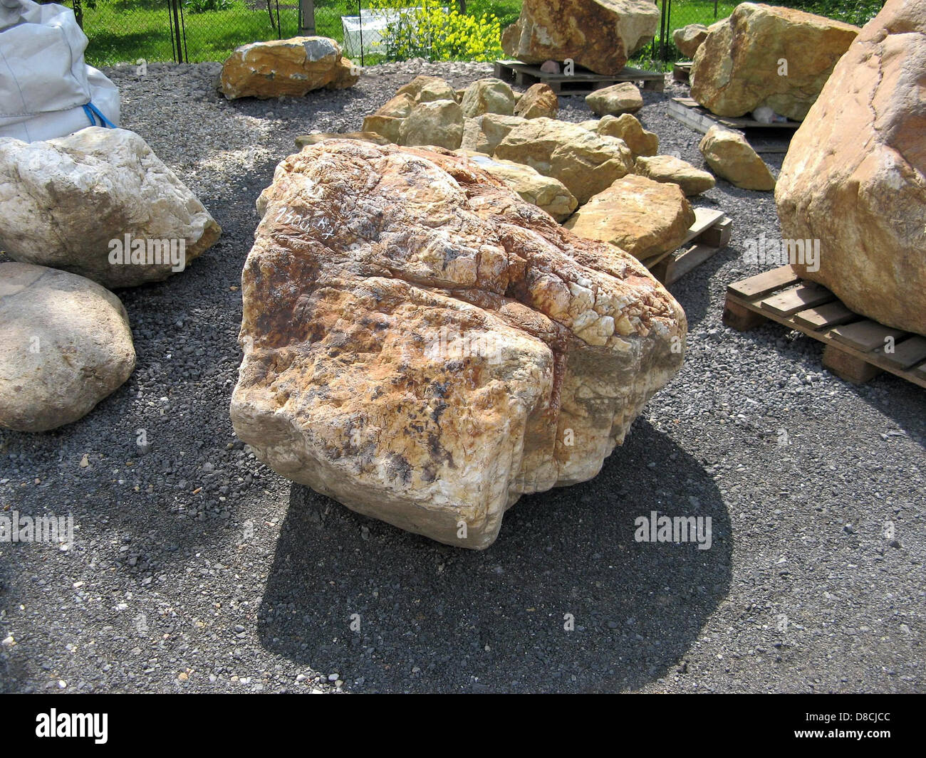 A decorative stone used in landscaping or as an ornamental piece. These ...