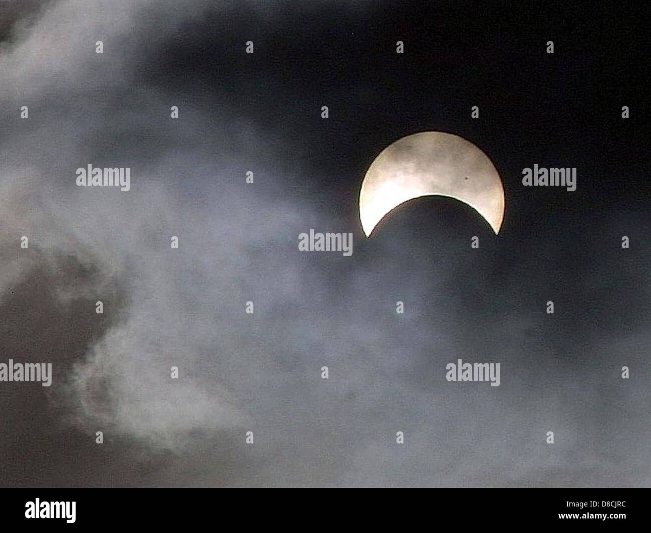 An image of a solar eclipse, where the moon blocks the sun, casting a ...