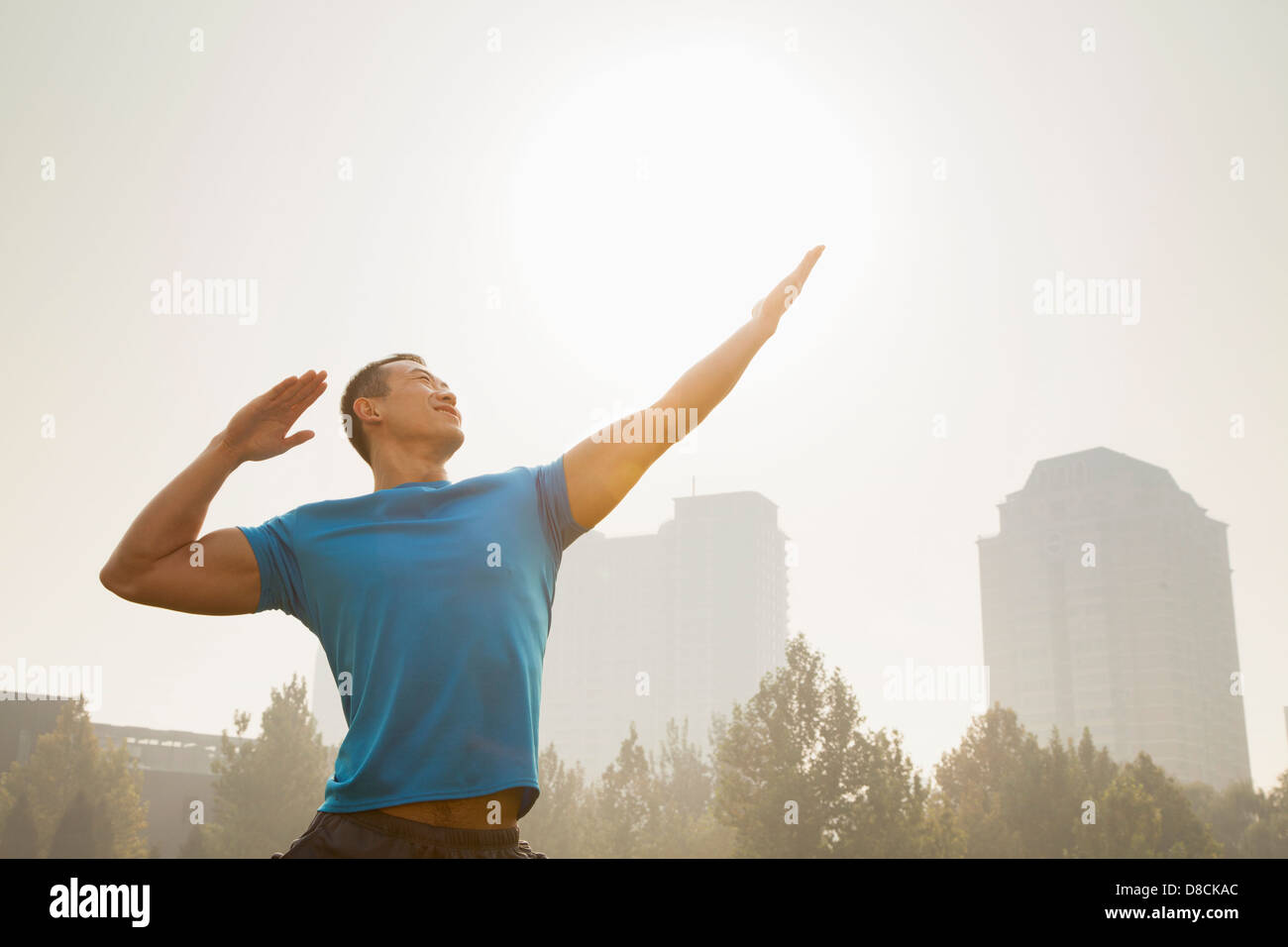 Young Muscular Man Stretching Stock Photo - Alamy