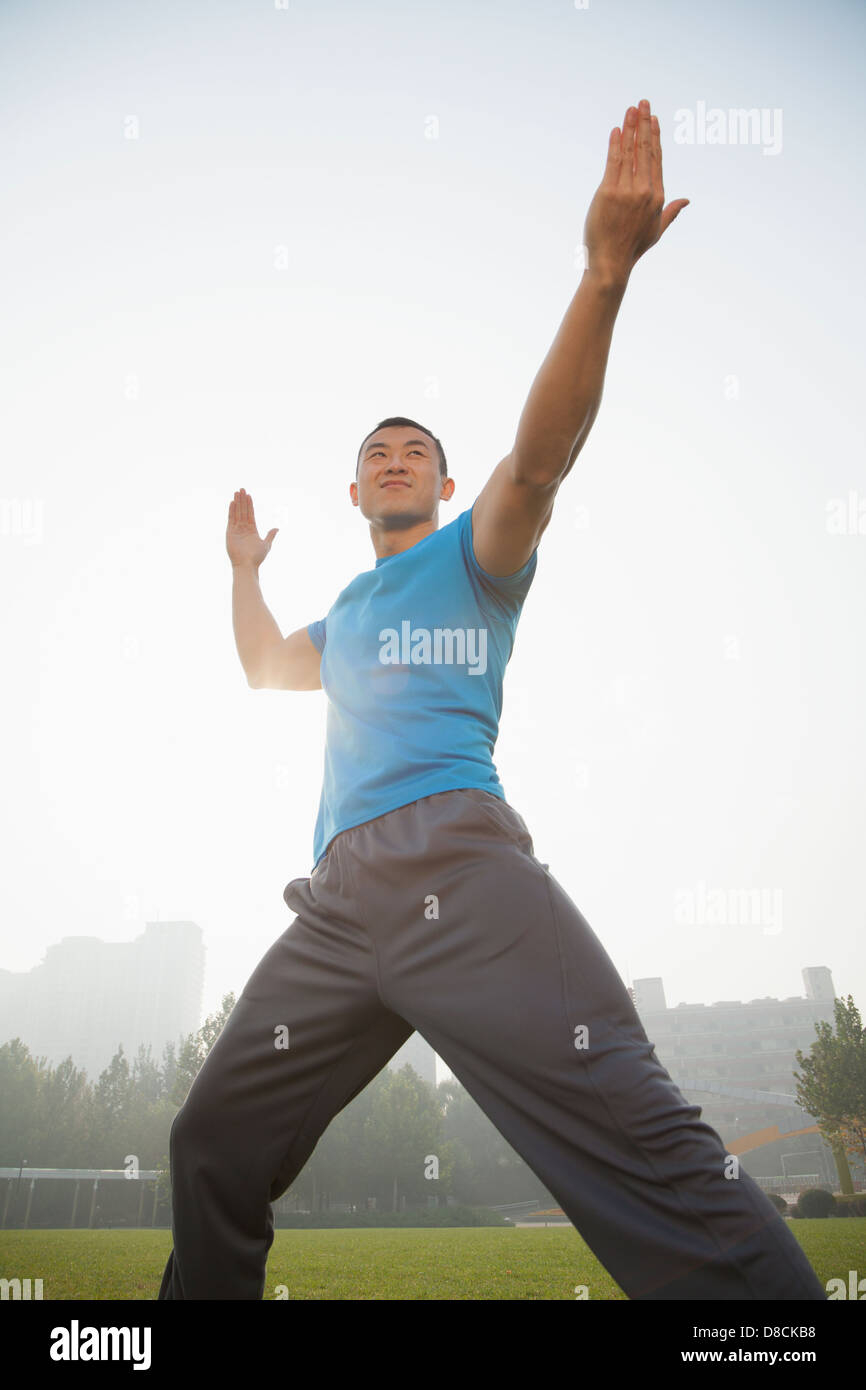Young Muscular Man Stretching Stock Photo - Alamy