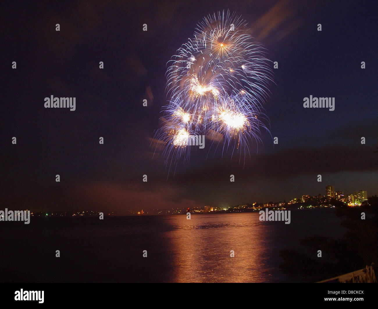 Firework over sea Stock Photo - Alamy