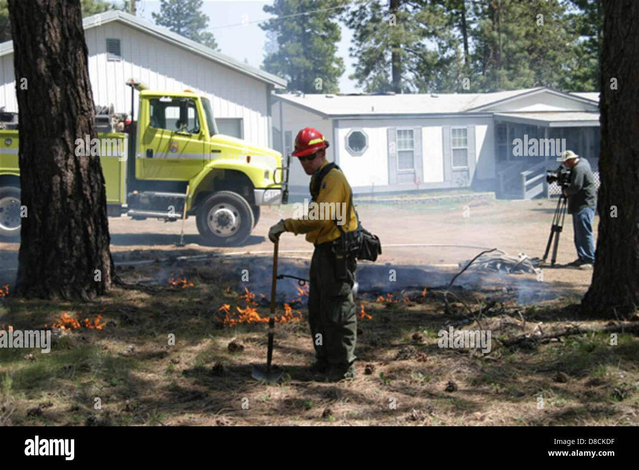Filming a fire education video, demonstrating safety procedures and ...