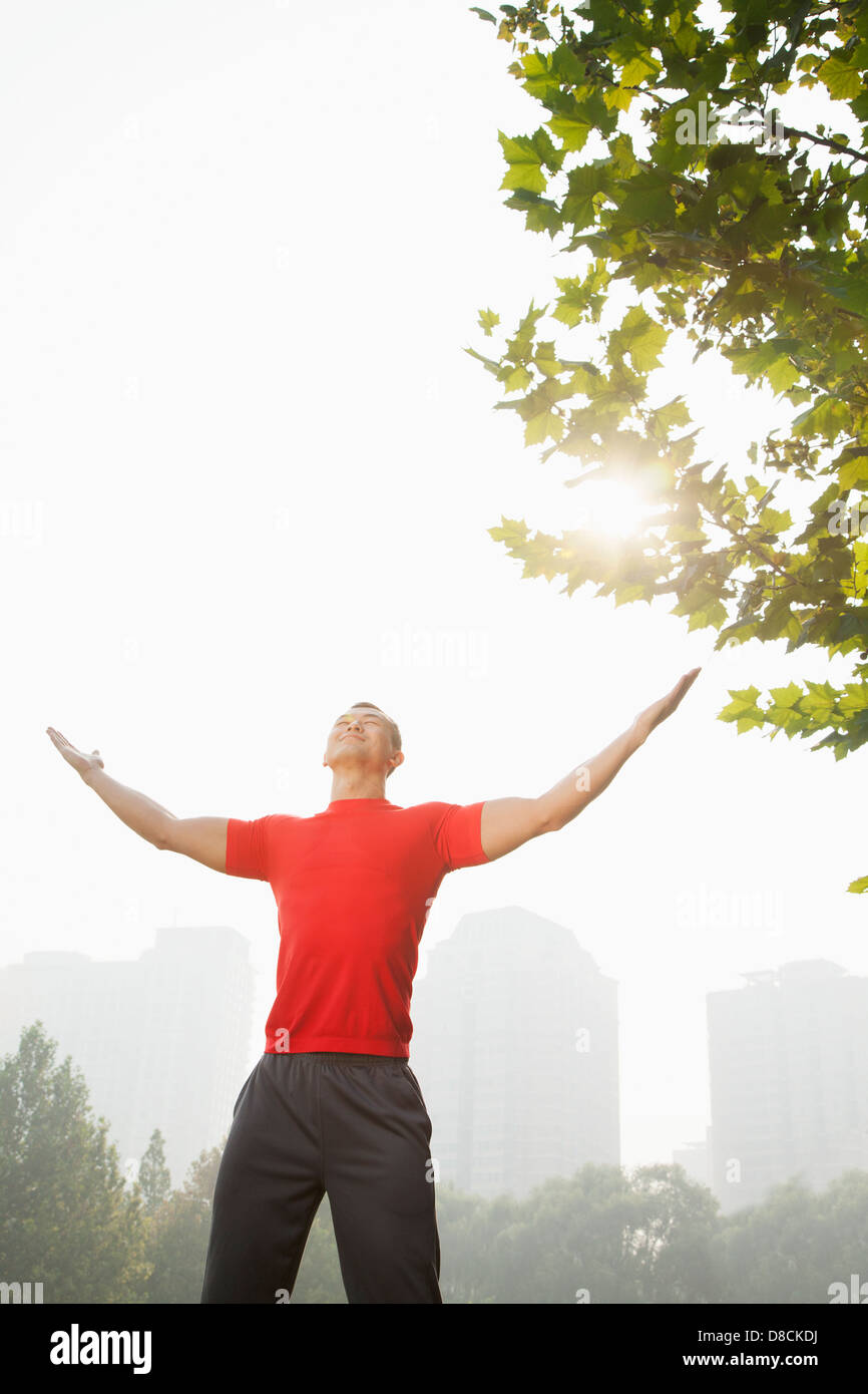 Young Muscular Man Stretching Stock Photo - Alamy