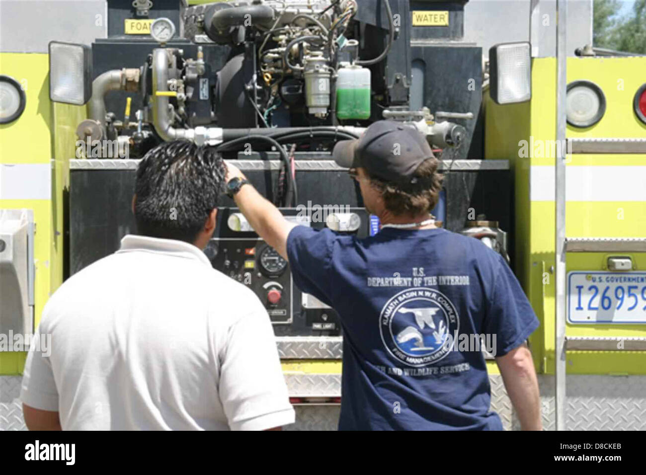 Fire truck engine usage training Stock Photo - Alamy