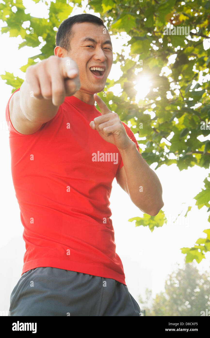 Young Muscular Man Pointing at Camera Stock Photo - Alamy