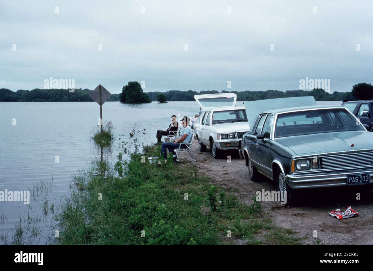 Fishing on river cars on coast Stock Photo - Alamy